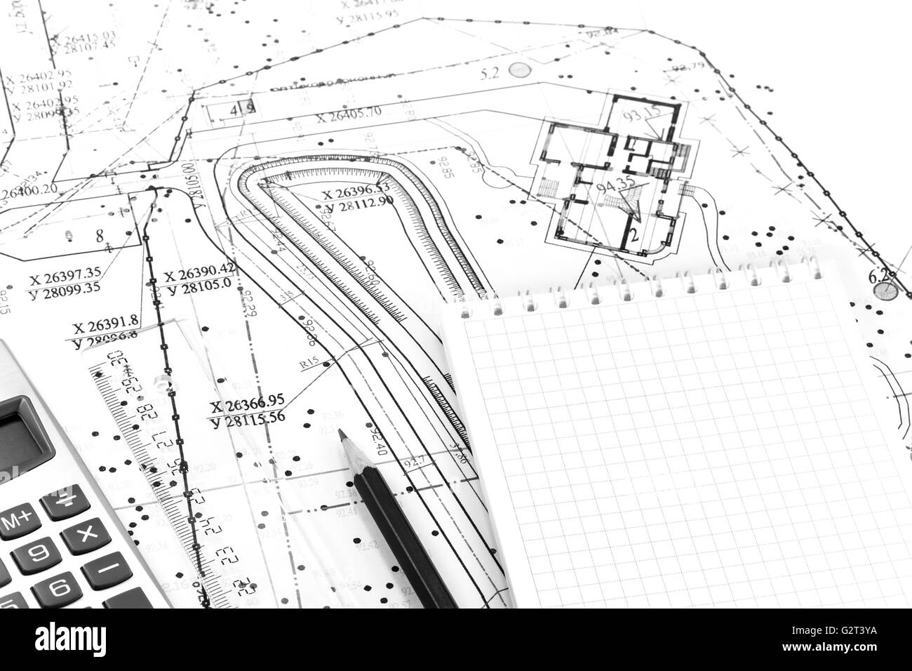 House building construction plans with calculator, pencil and compass ...