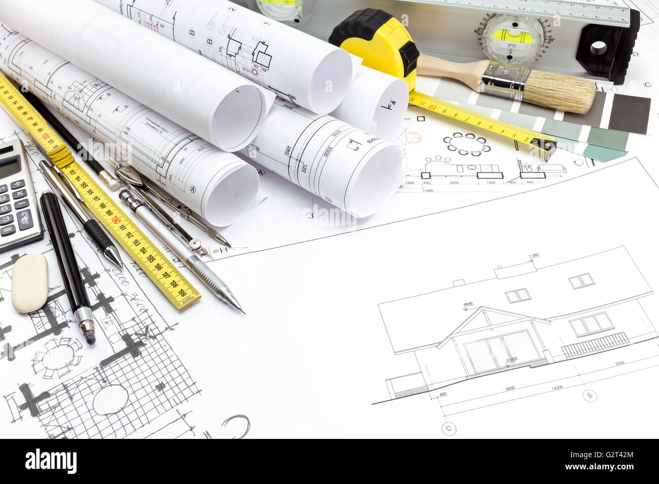 Architectural background with technical drawings and work tools Stock ...