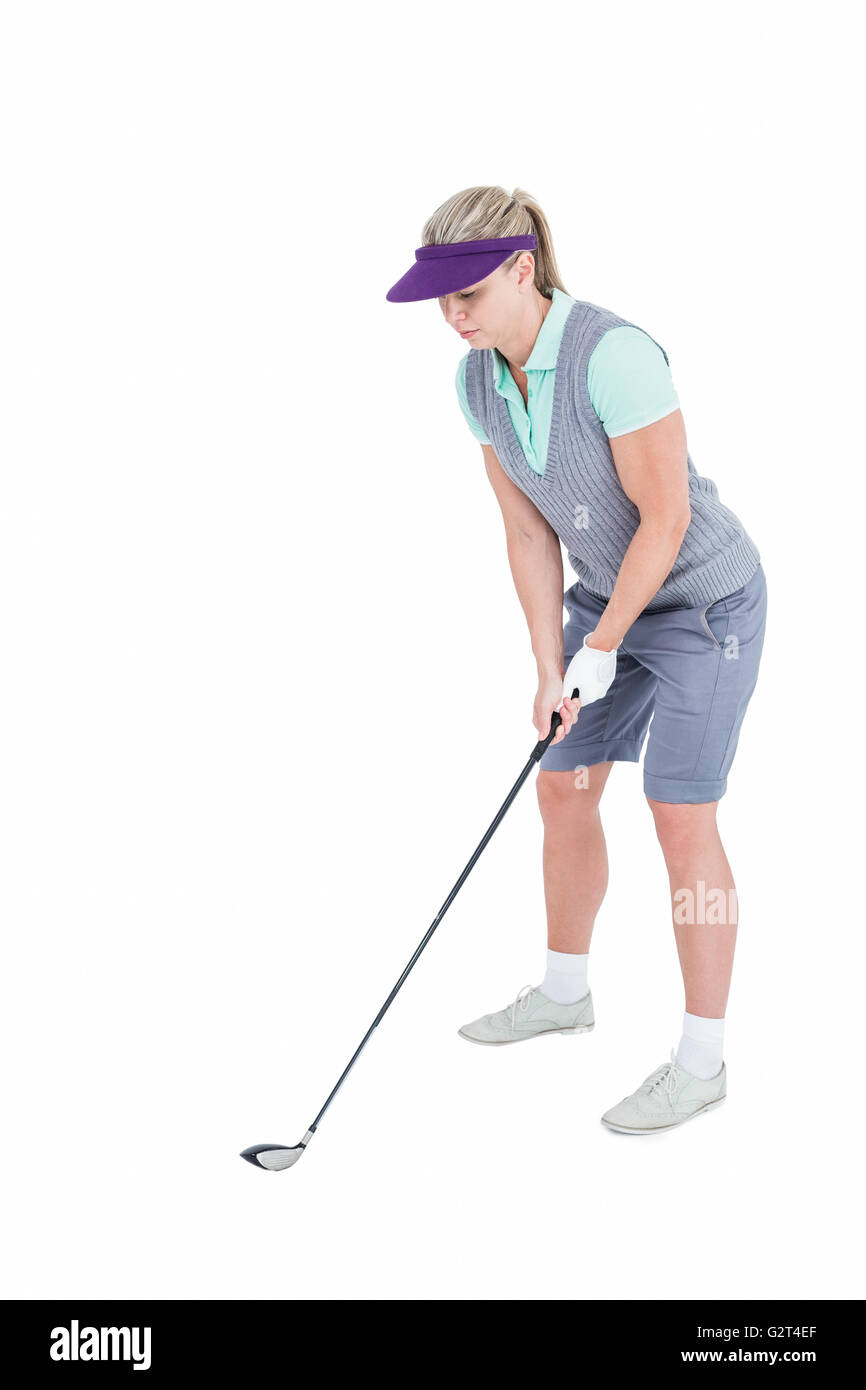Pretty blonde playing golf Stock Photo - Alamy