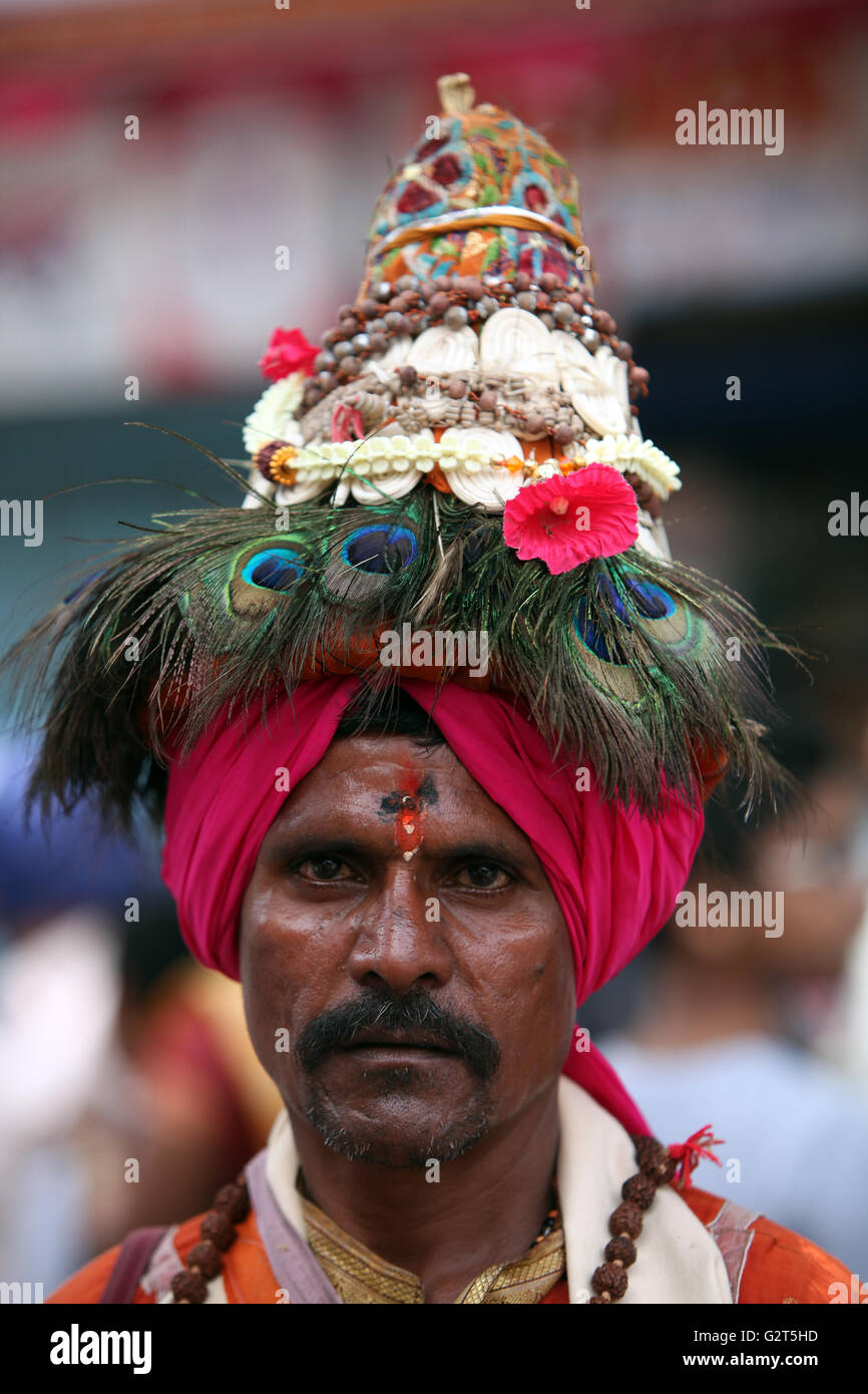 Pune, India - July 11, 2015: A portrait of a Vasudev, pilgrims who are ...