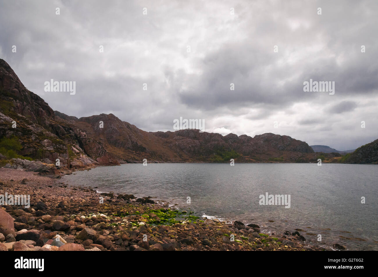 The end of Loch Diabaig in Wester-Ross, Scotland, with heavy clouds and ...