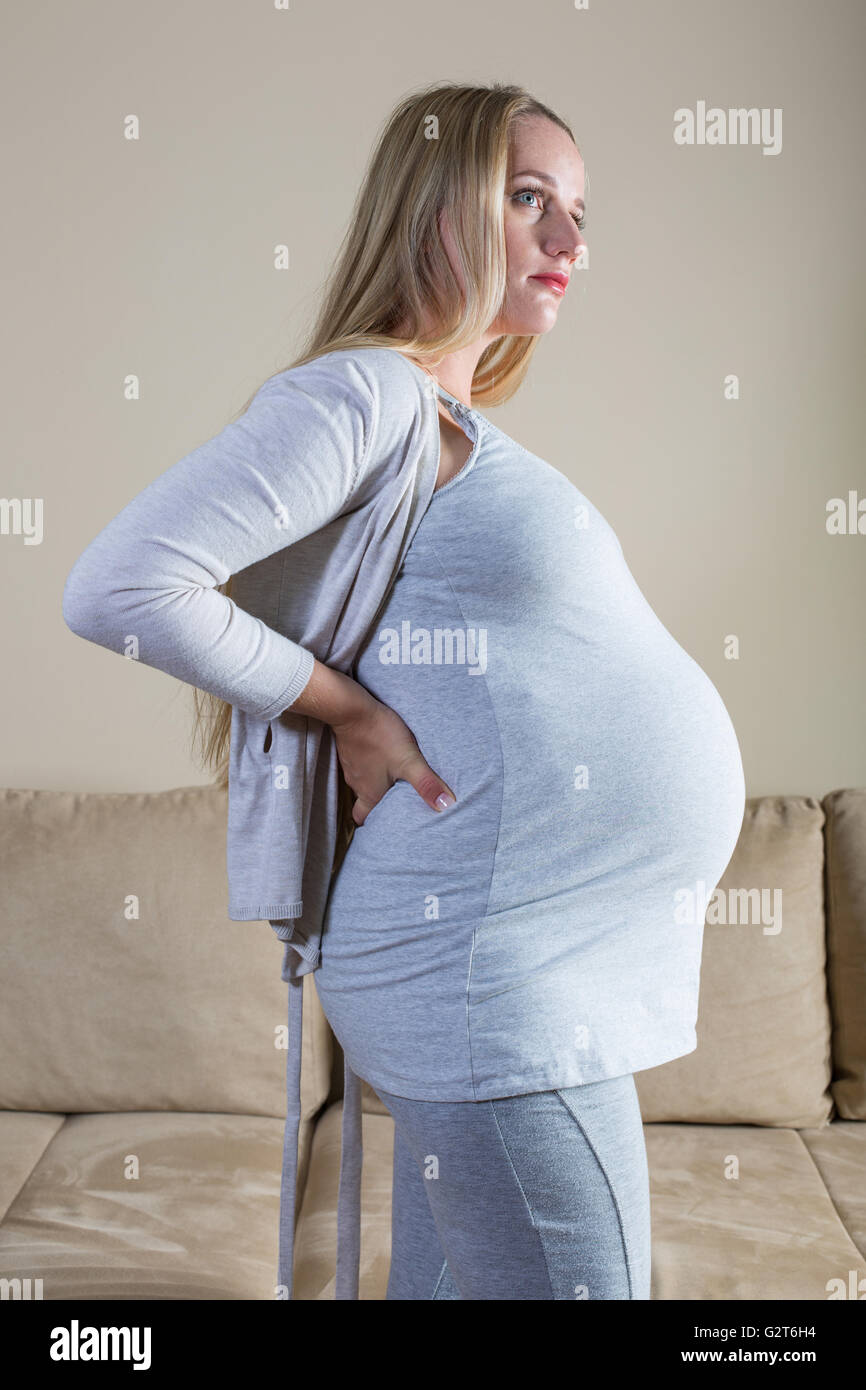 pain and discomfort during pregnancy Stock Photo - Alamy