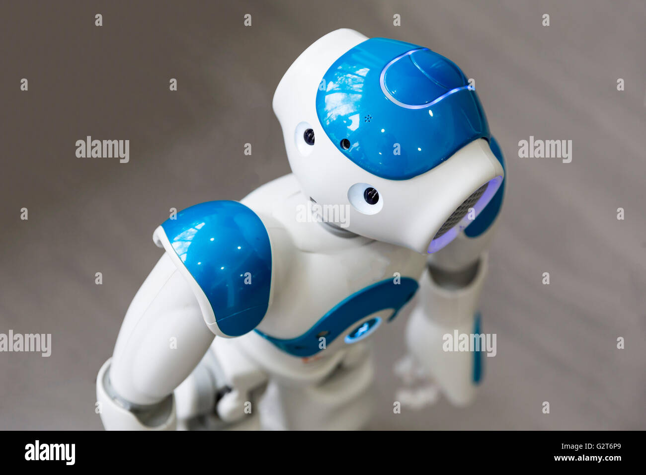 A small robot with human face and body - humanoid. Artificial ...