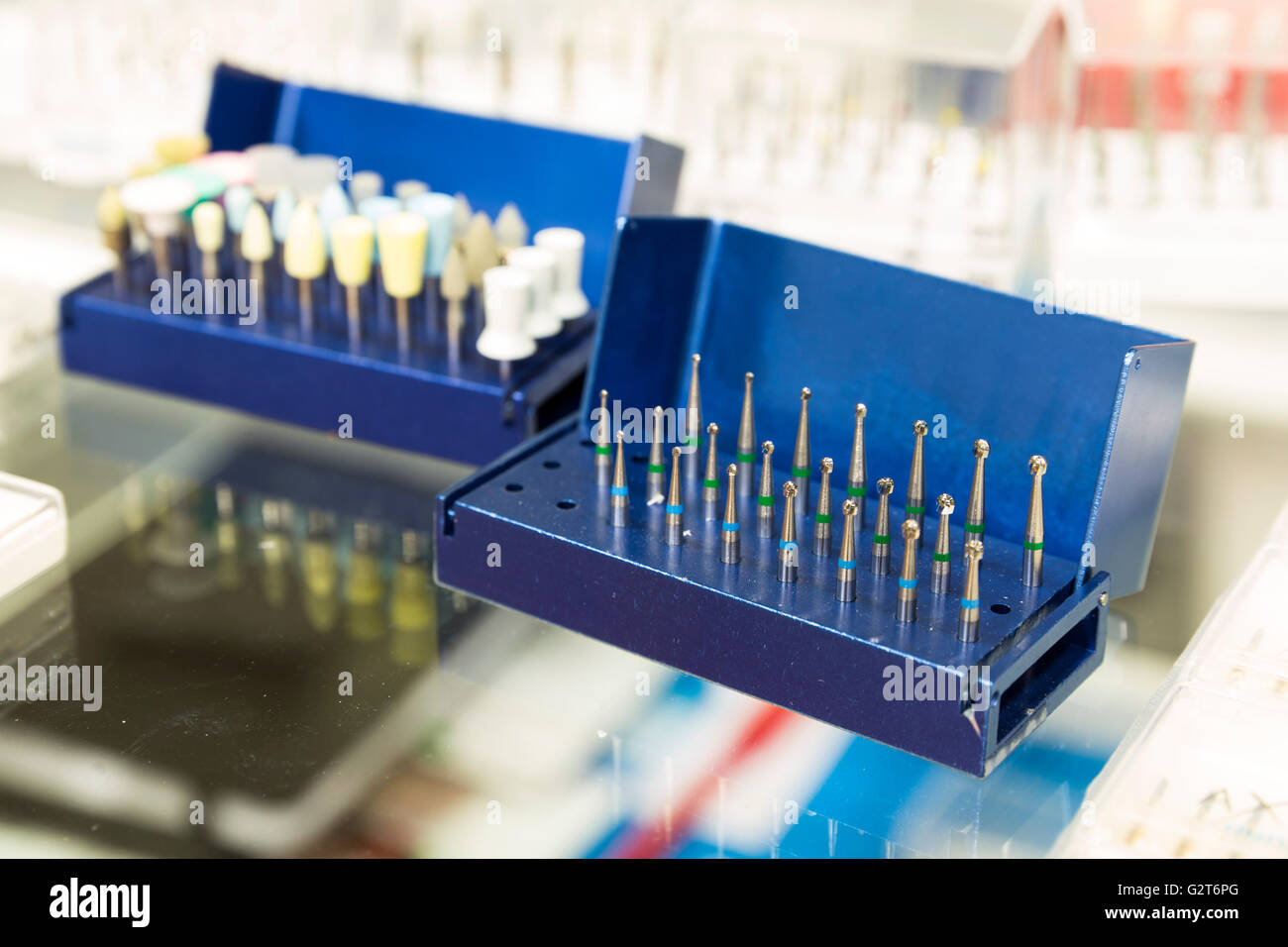 Dental instruments for stomatology practice. Blue box Stock Photo - Alamy