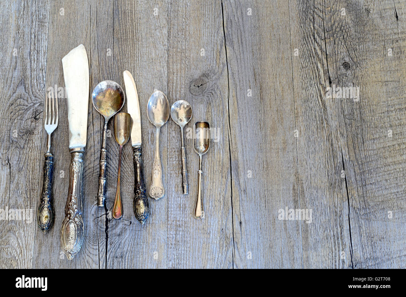 Vintage silverware on rustic wooden table. Classic background Stock ...