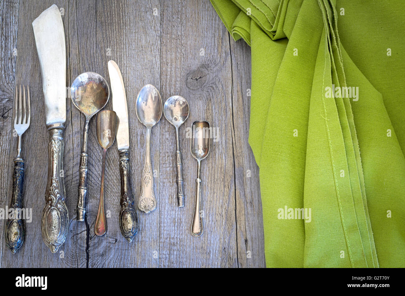 Vintage silverware on rustic wooden table. Classic background Stock ...