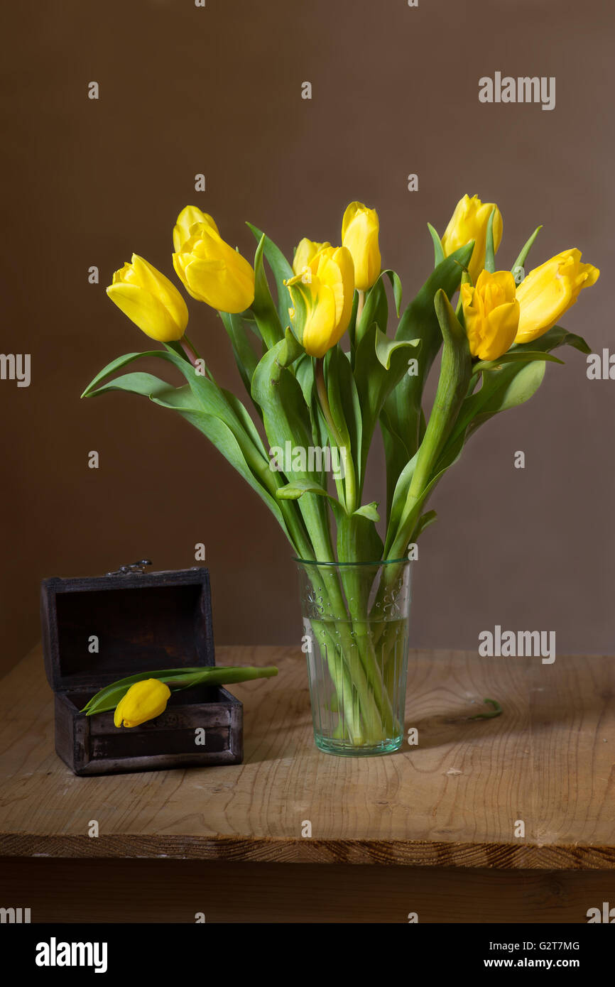 Still life with a bunch of yellow tulips Stock Photo - Alamy
