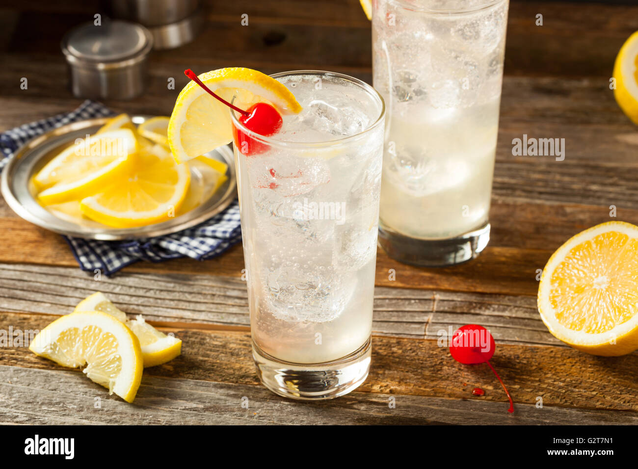 Refreshing Classic Tom Collins Cocktail with a Cherry and Lemon Slice ...