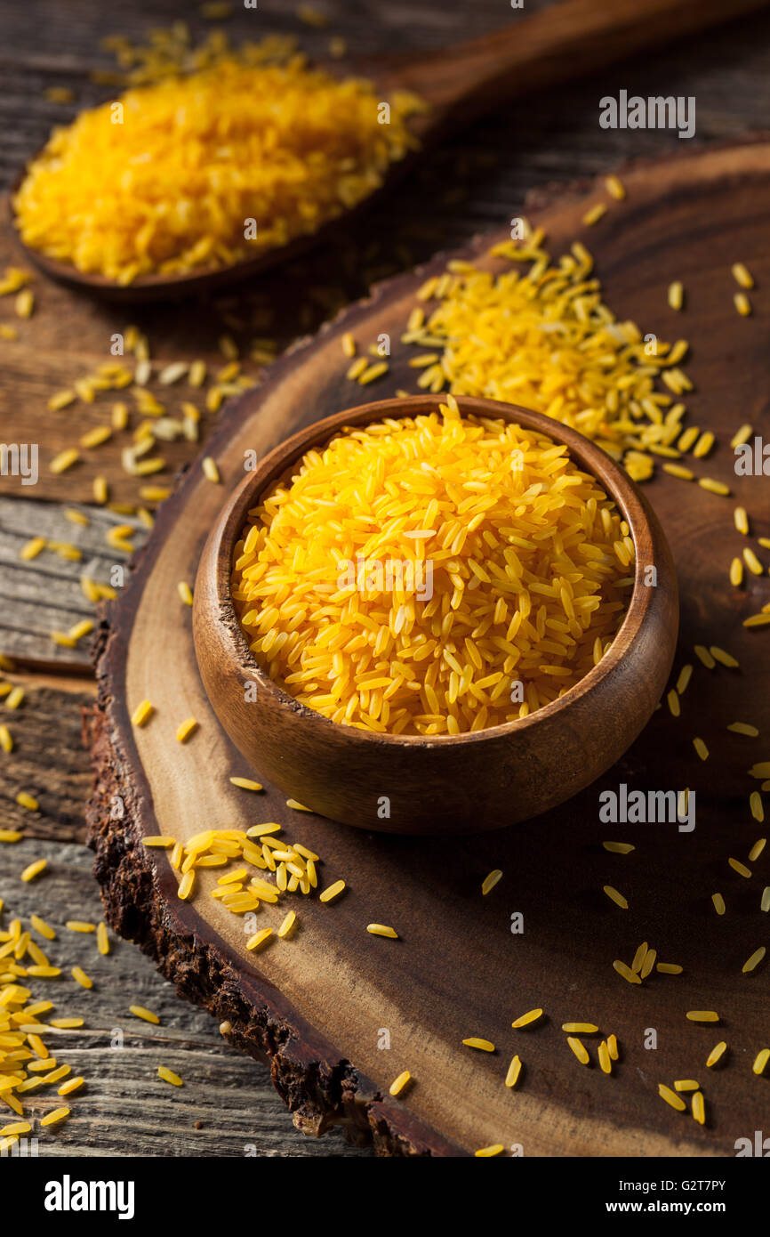Raw Organic Yellow Saffron Rice in a Bowl Stock Photo - Alamy
