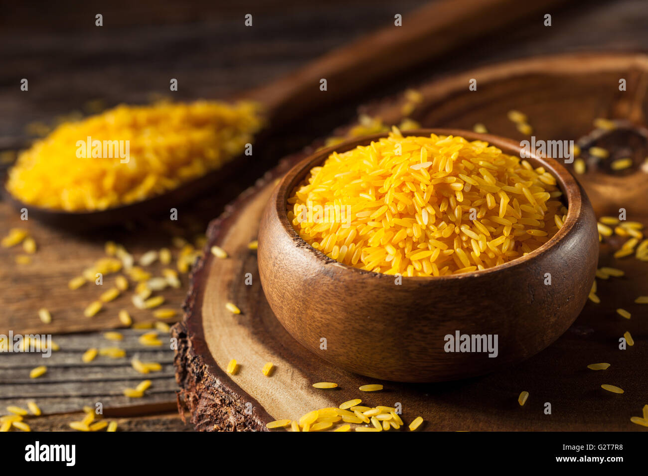 Raw Organic Yellow Saffron Rice in a Bowl Stock Photo - Alamy