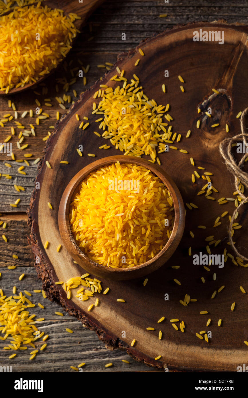Raw Organic Yellow Saffron Rice in a Bowl Stock Photo - Alamy