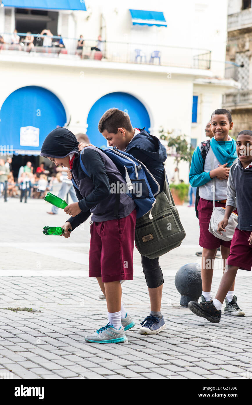 Children playing after school in the streets of the neighborhood of La ...