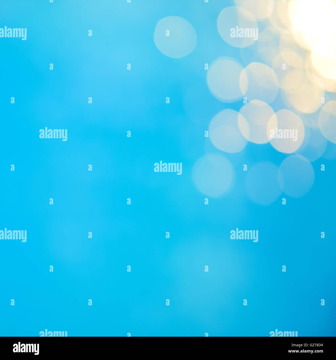 Soft focus bokeh light effects over a rippled, blue water background in the pool Stock Photo - Alamy