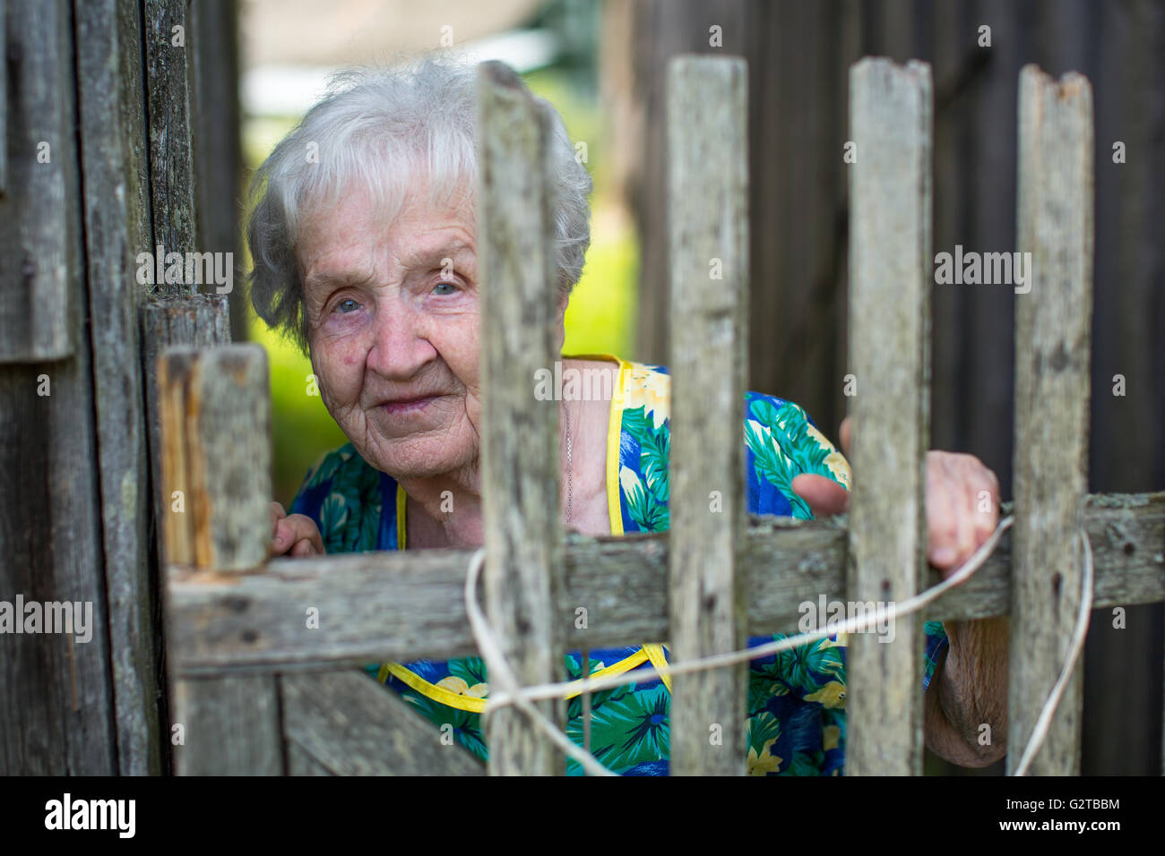 Mature women garden fence hi-res stock photography and images - Alamy