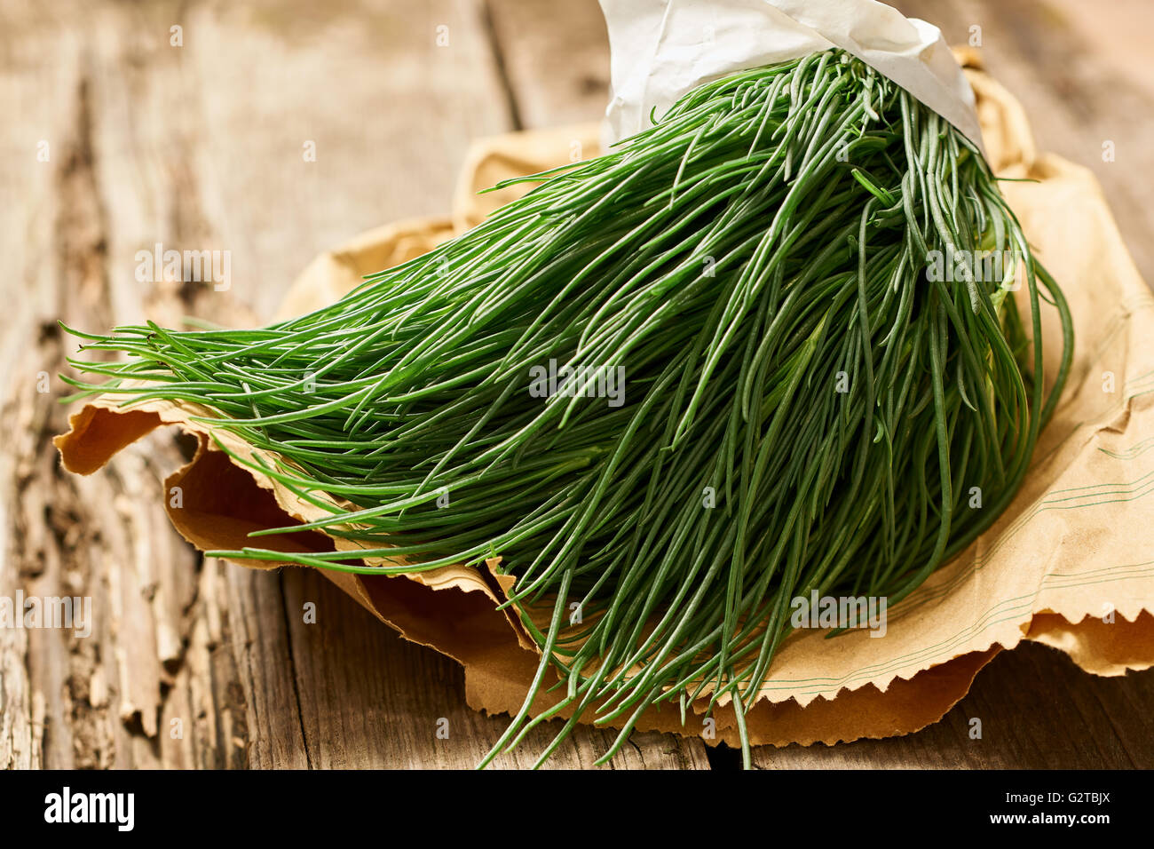 Fresh barilla plant resting on an old table Stock Photo - Alamy