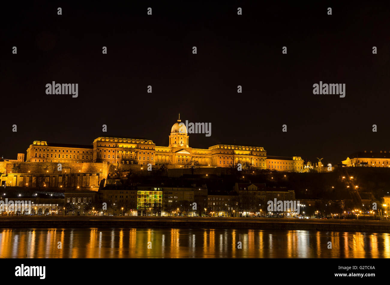 Buda Castle (Royal Palace) by the Danube river illuminated at night in ...