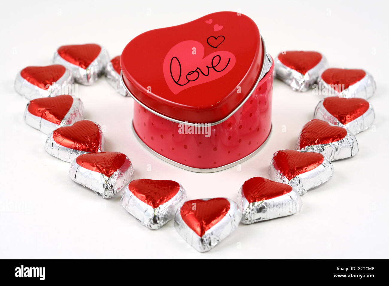 Heart-shaped box with heart-shaped chocolates Stock Photo - Alamy