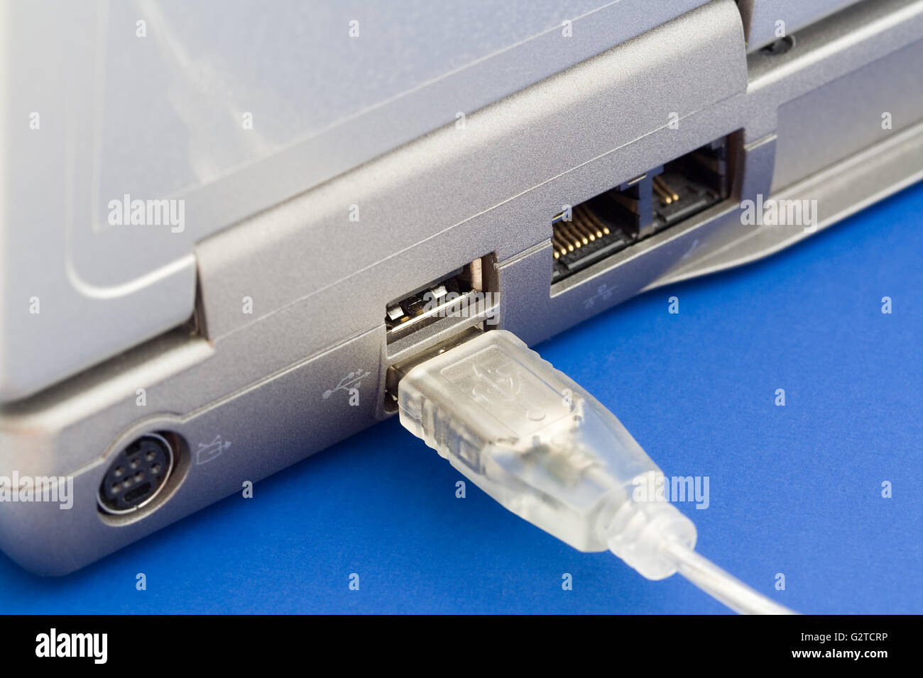 Laptop connection with USB Stock Photo - Alamy