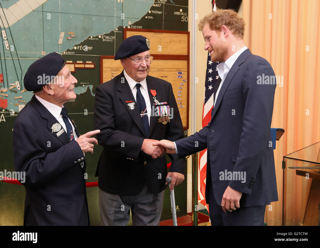 Prince Harry meets veterans John Dennett (left) and Frank Diffell ...