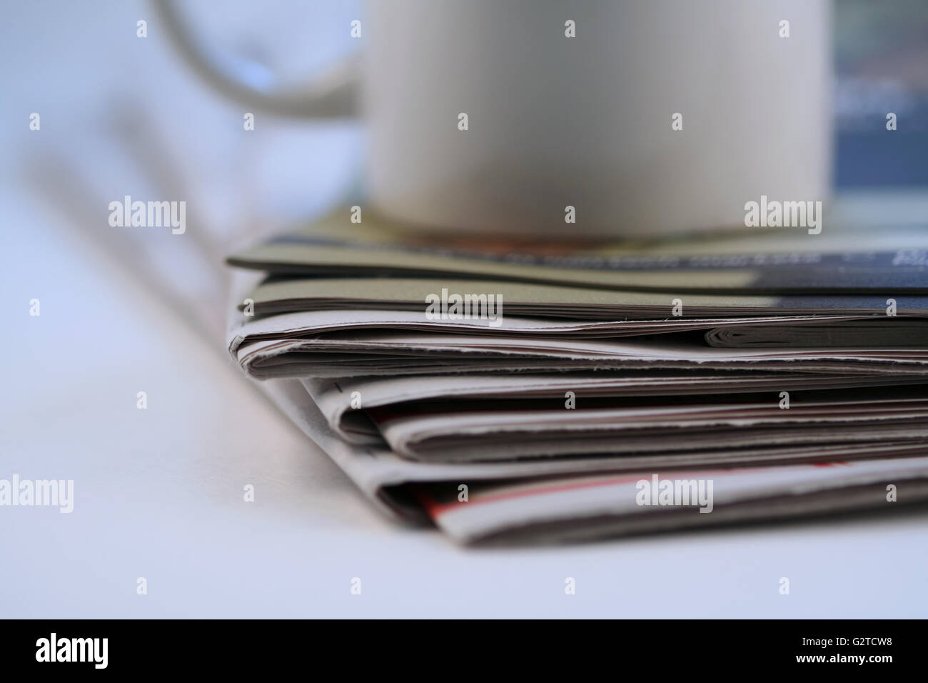 Stack of newspaper to read in the morning Stock Photo - Alamy