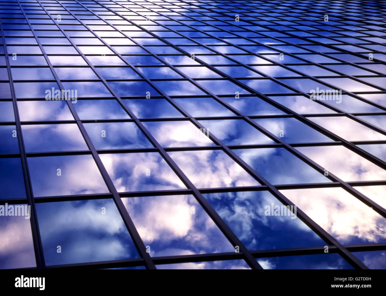 Clouds reflection on office windows Stock Photo - Alamy