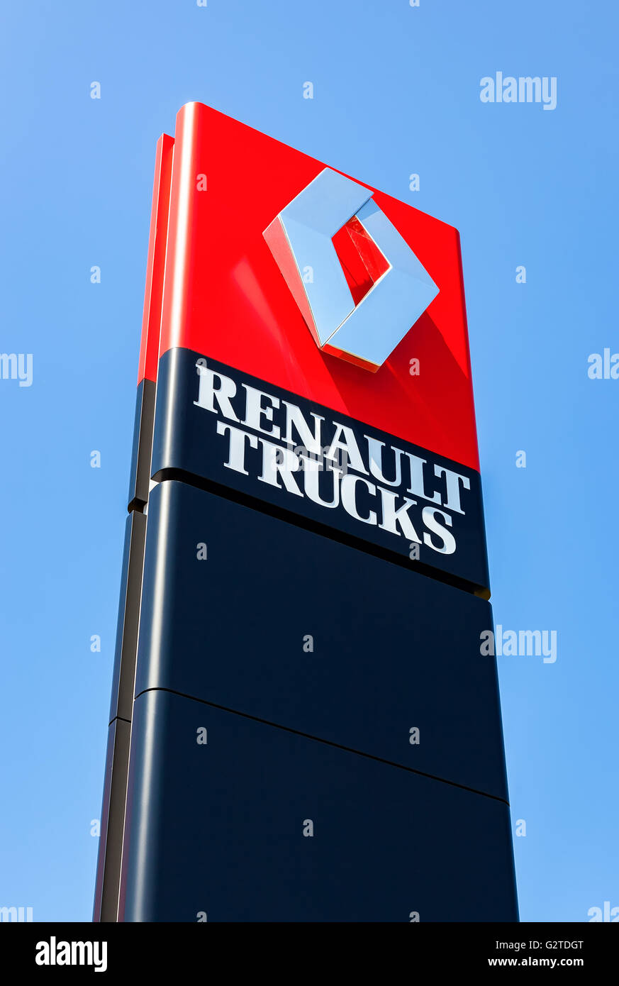 Official dealership sign Renault over blue sky. Renault is a French ...