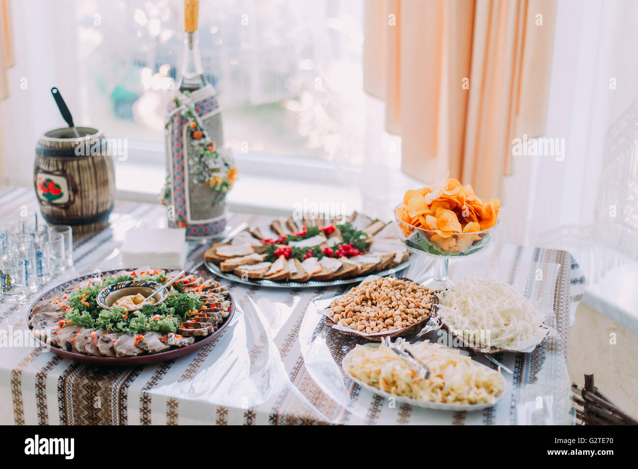 Table of different tasty snacks, served in traditional east slavic ...
