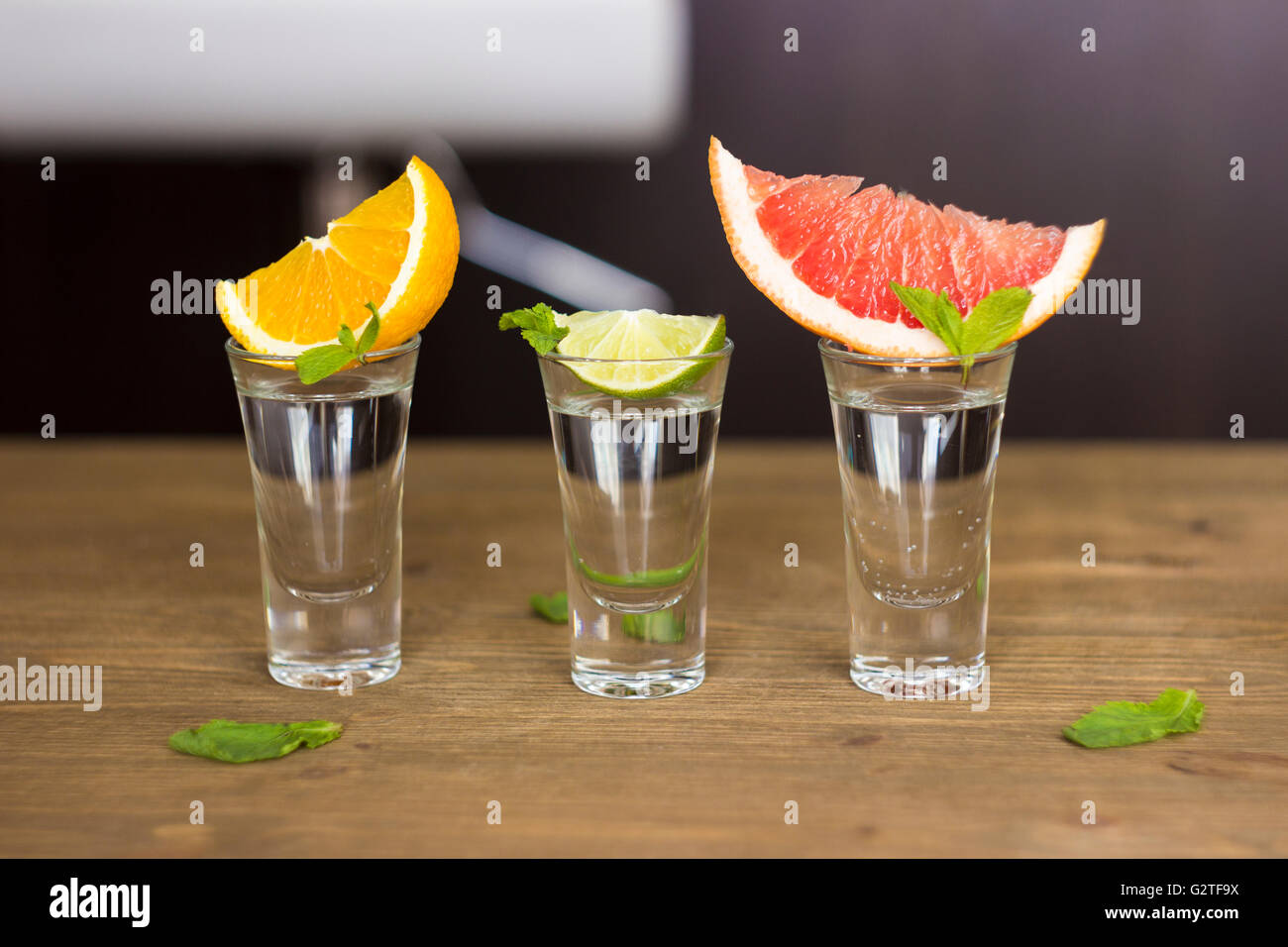 Shot drink set on bar background Stock Photo - Alamy