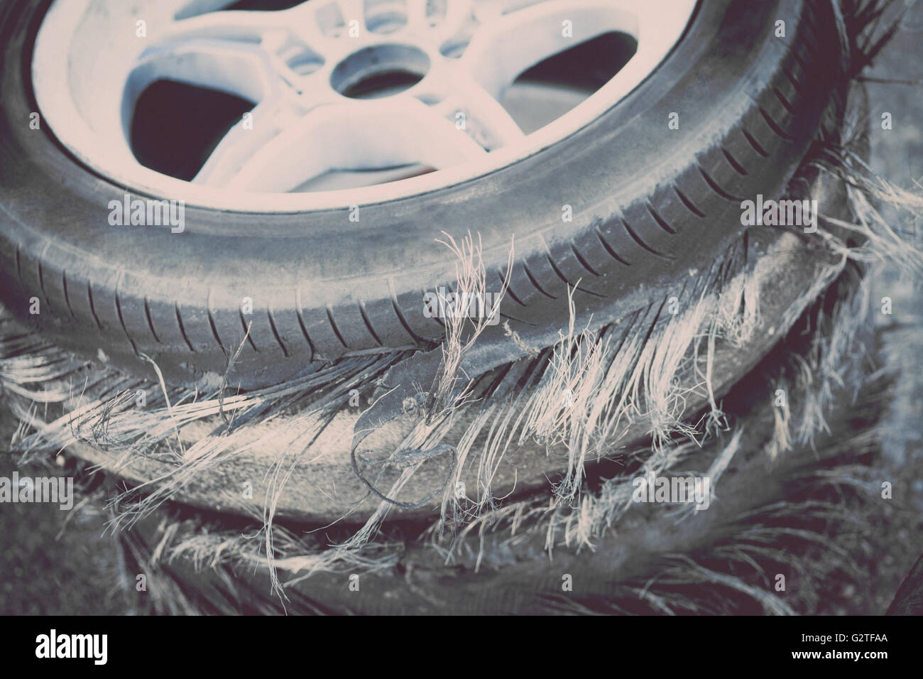 Close up shot of a pile of blown out tires Stock Photo - Alamy