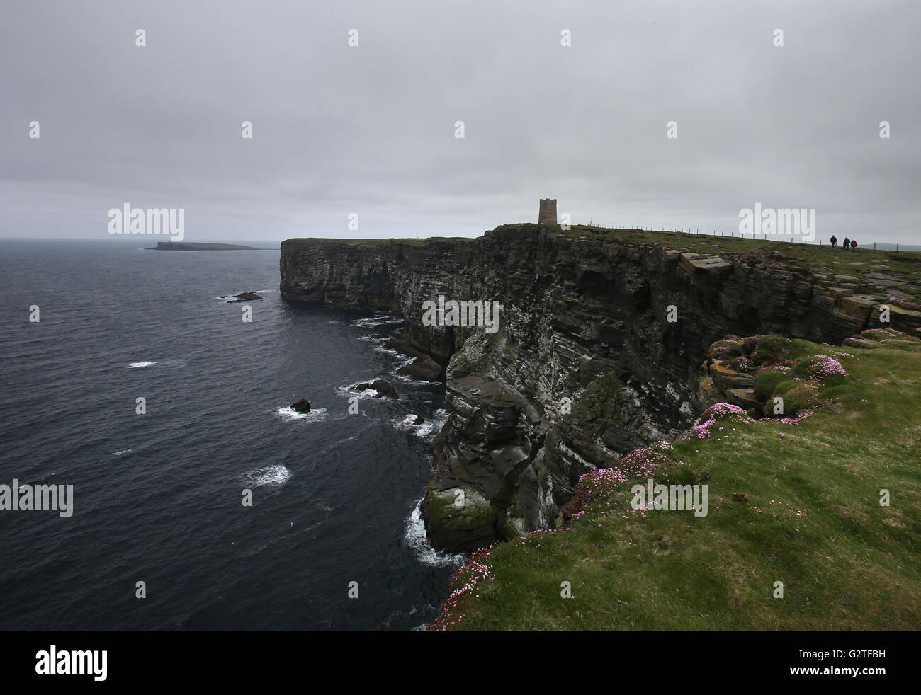 A visitor looks at a tower built to hold the restored Kitchener ...