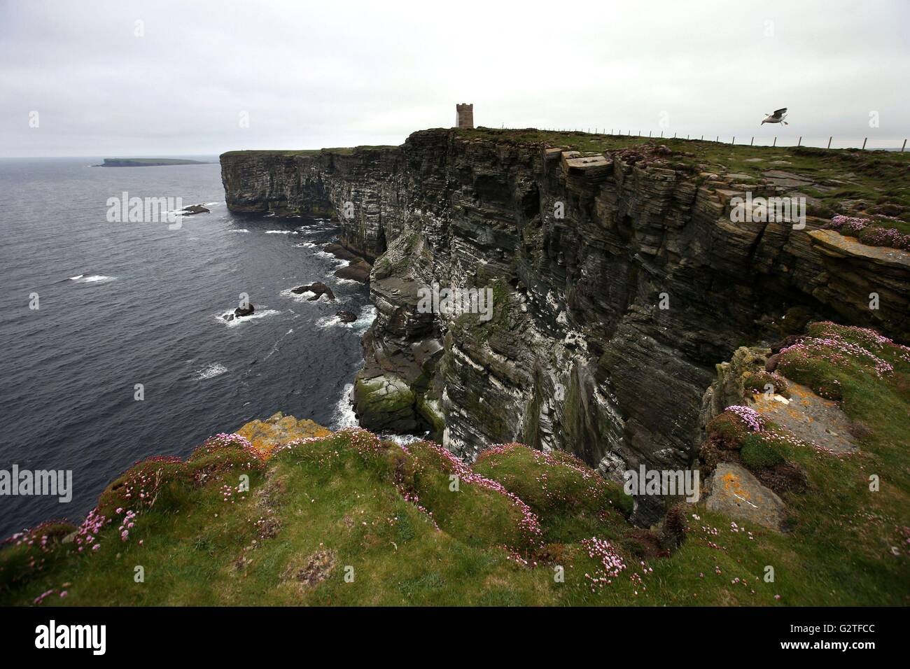 A visitor looks at a tower built to hold the restored Kitchener ...