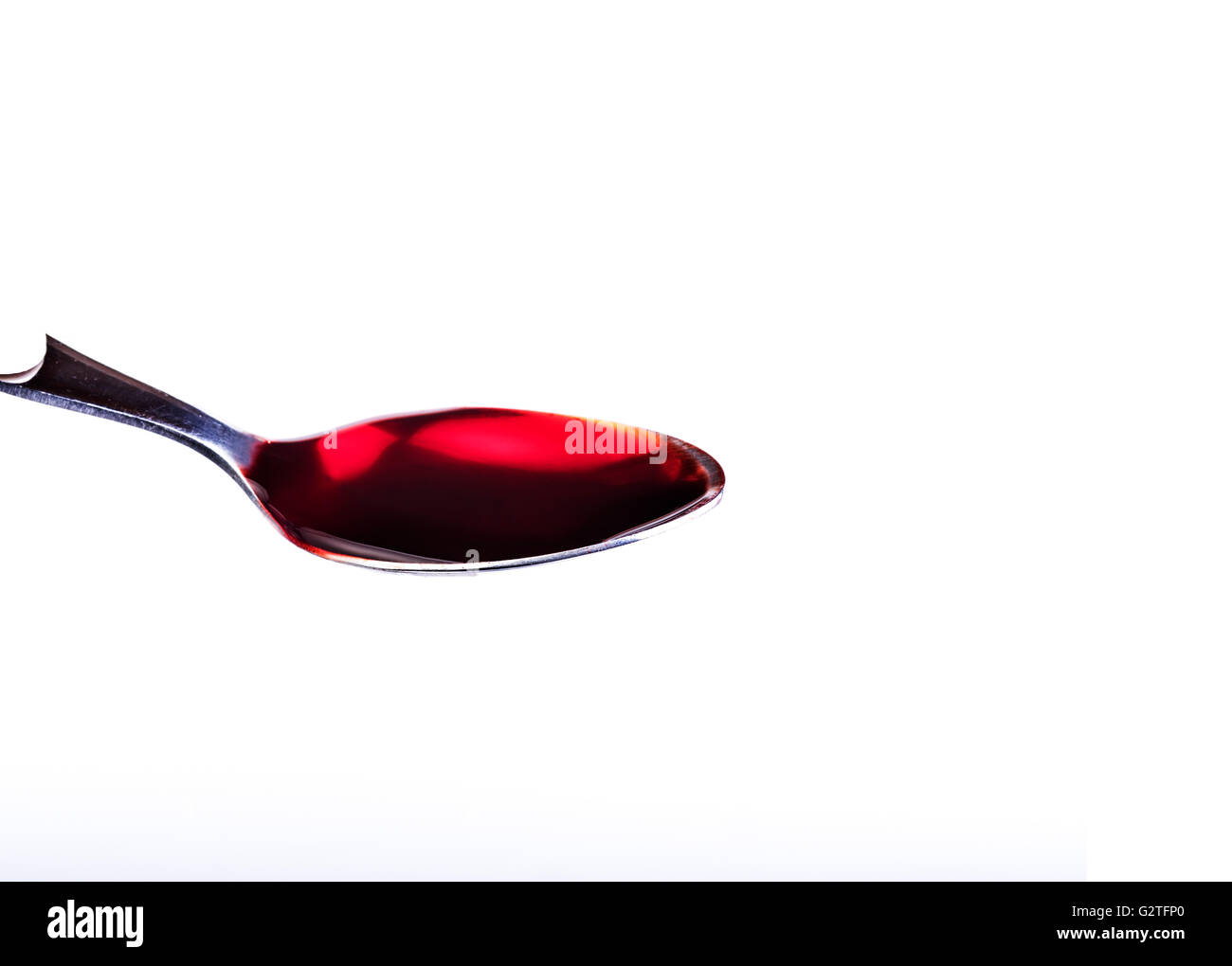 Spoonful medicine red liquid medicine hi-res stock photography and ...