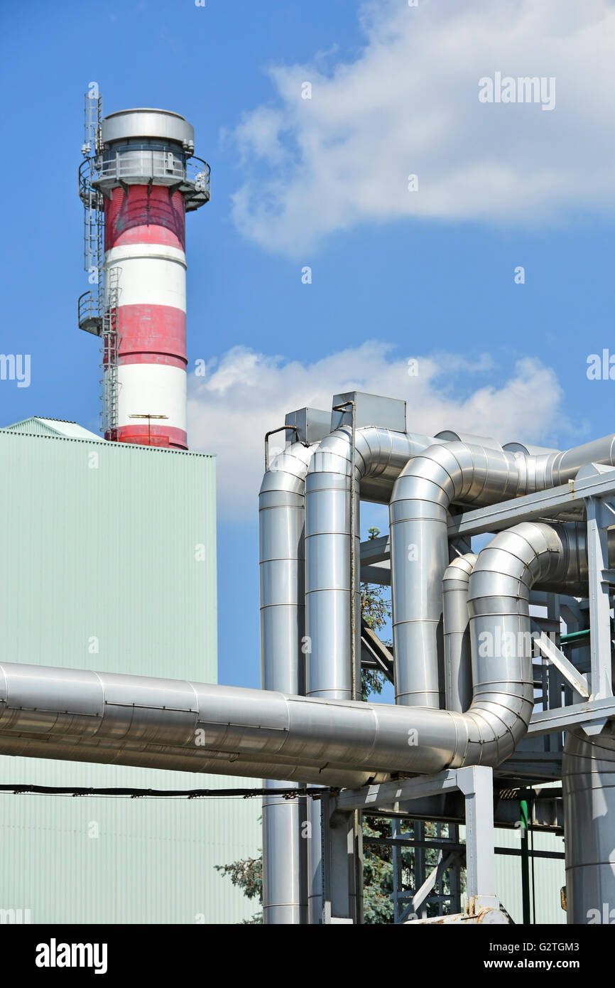 Pipeline and smoke stack of the power station Stock Photo - Alamy