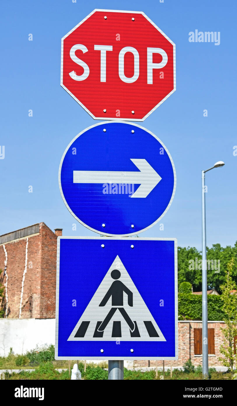 Stop sign at the pedestrian crossing in the city Stock Photo - Alamy
