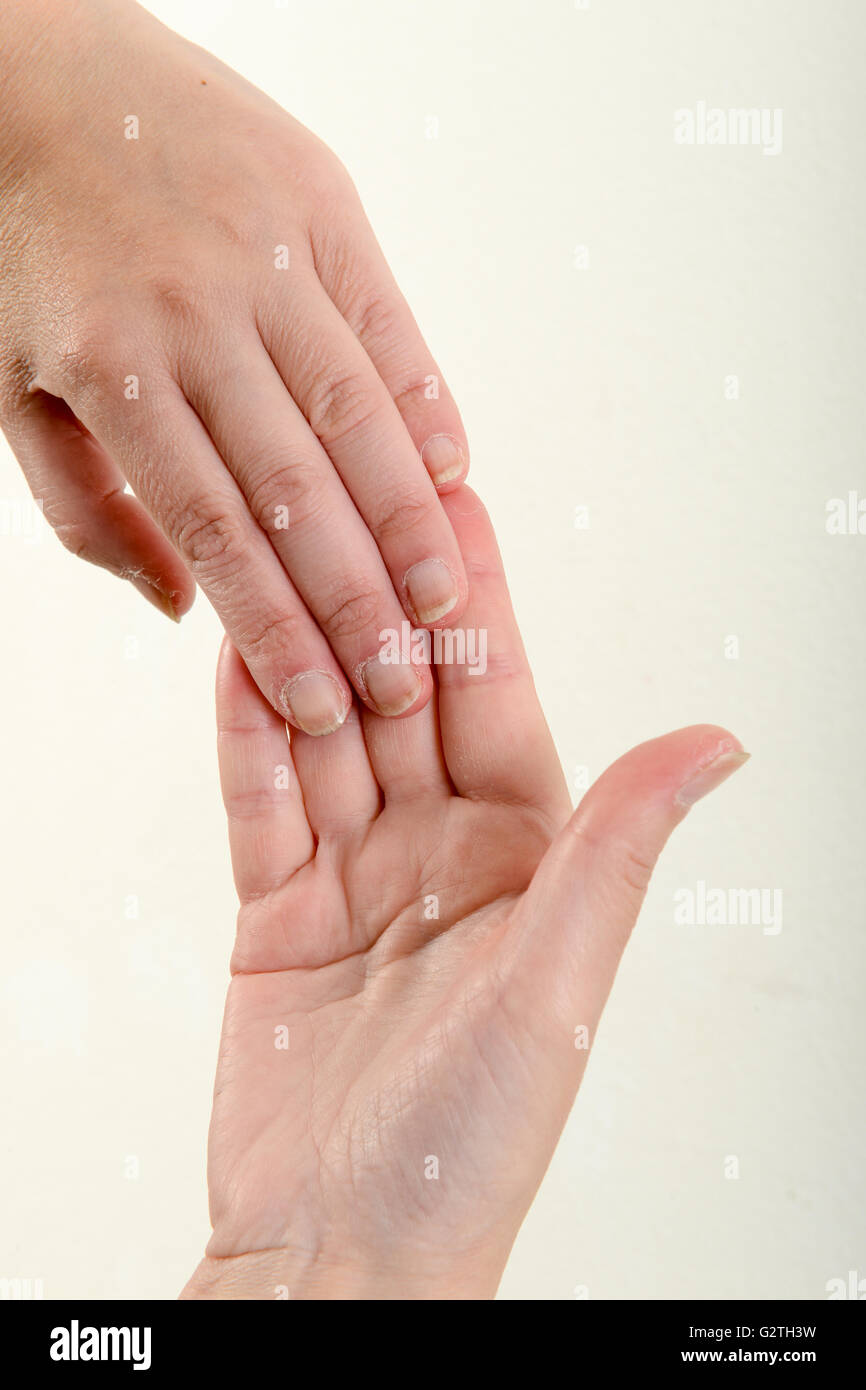 Two hands are doing stretching on white background Stock Photo - Alamy