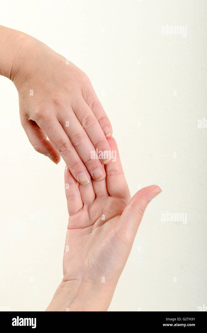 Two hands are doing stretching on white background Stock Photo - Alamy