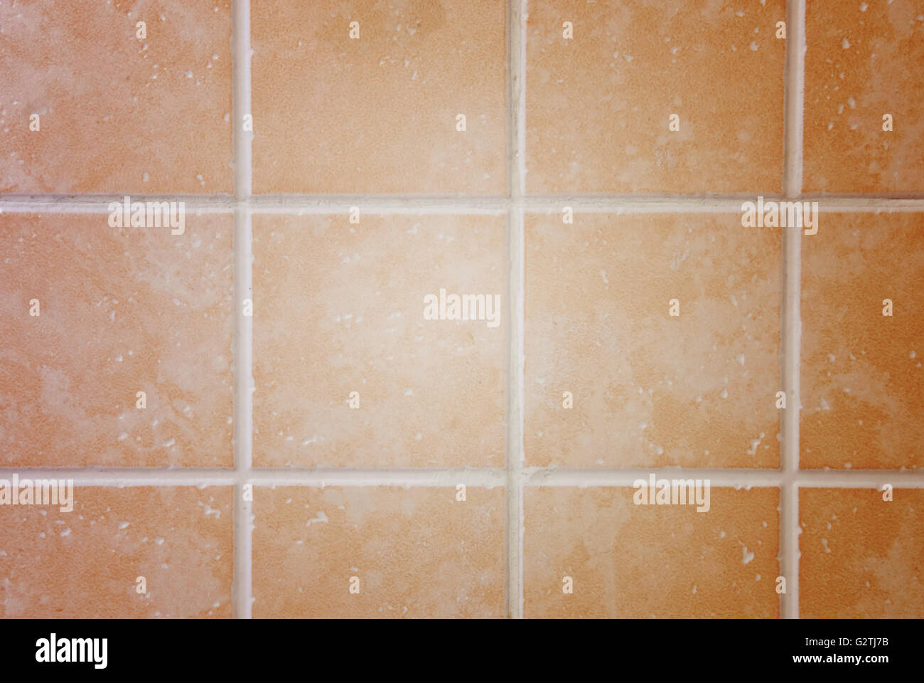 Square wall tiles on kitchen wall. Background. Close up image Stock ...