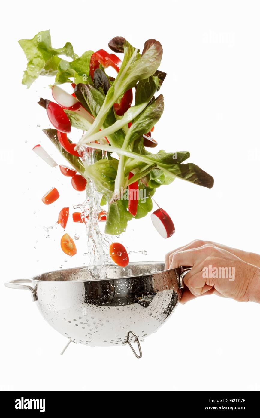 Salad ingredients being washed Stock Photo - Alamy
