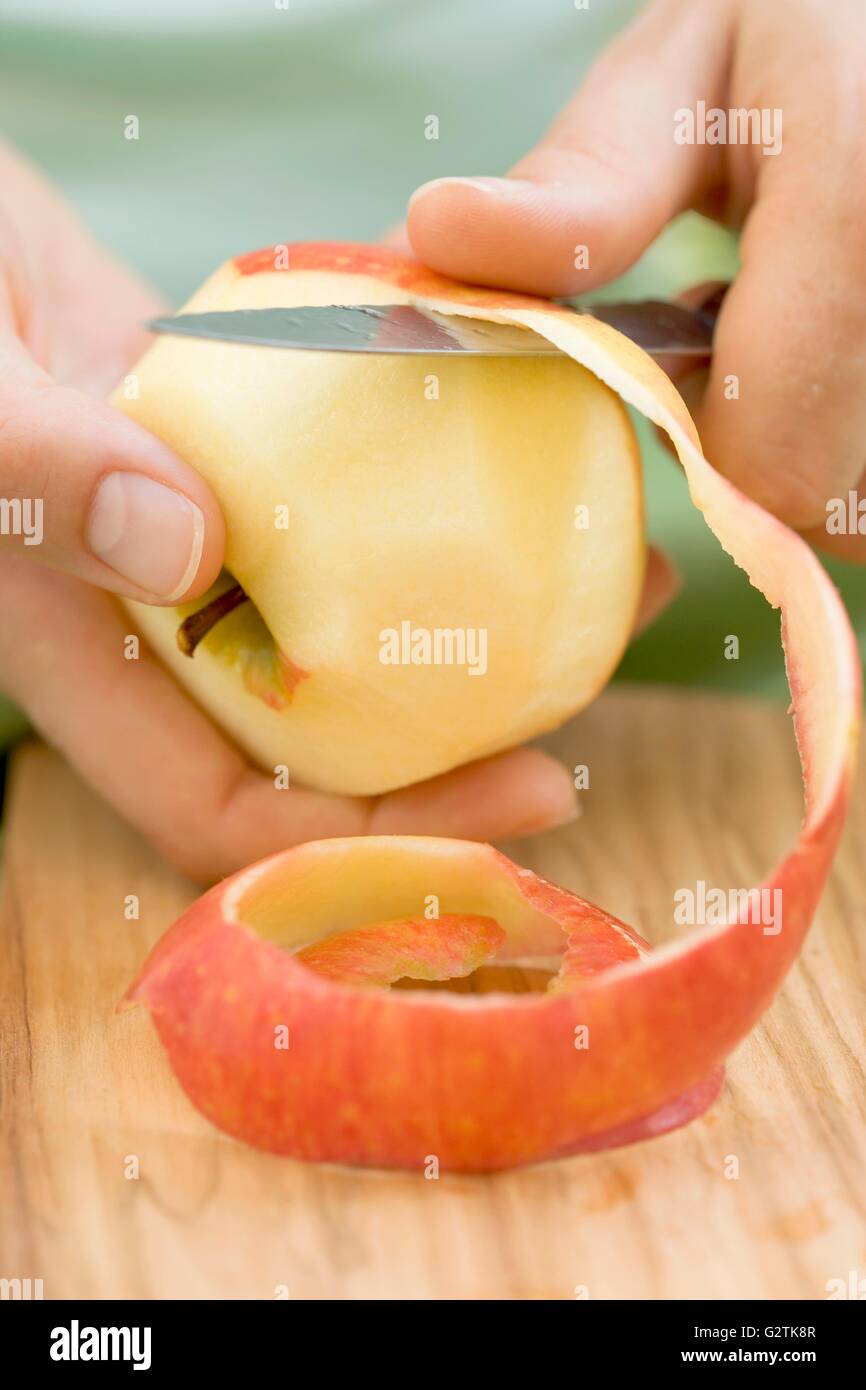 Peeling an apple Stock Photo - Alamy