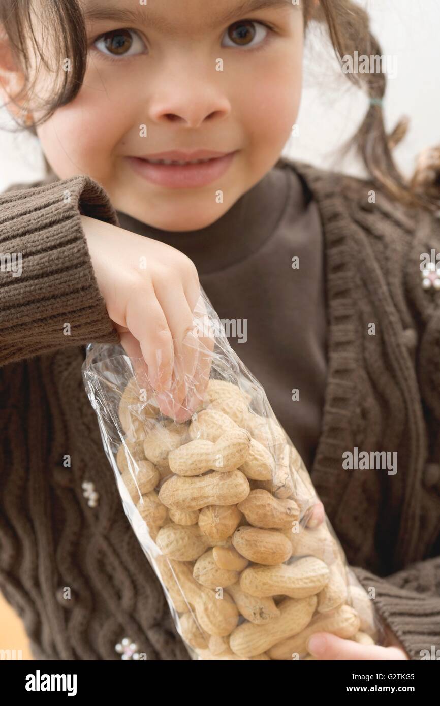 Peanuts held hi-res stock photography and images - Alamy
