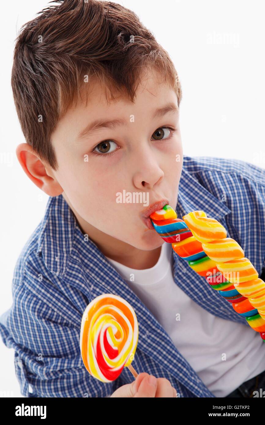 A little boy eating a giant lolly Stock Photo - Alamy