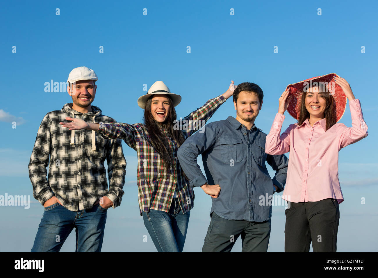 Young Friends Staying and Expressing Positive Emotions Stock Photo - Alamy