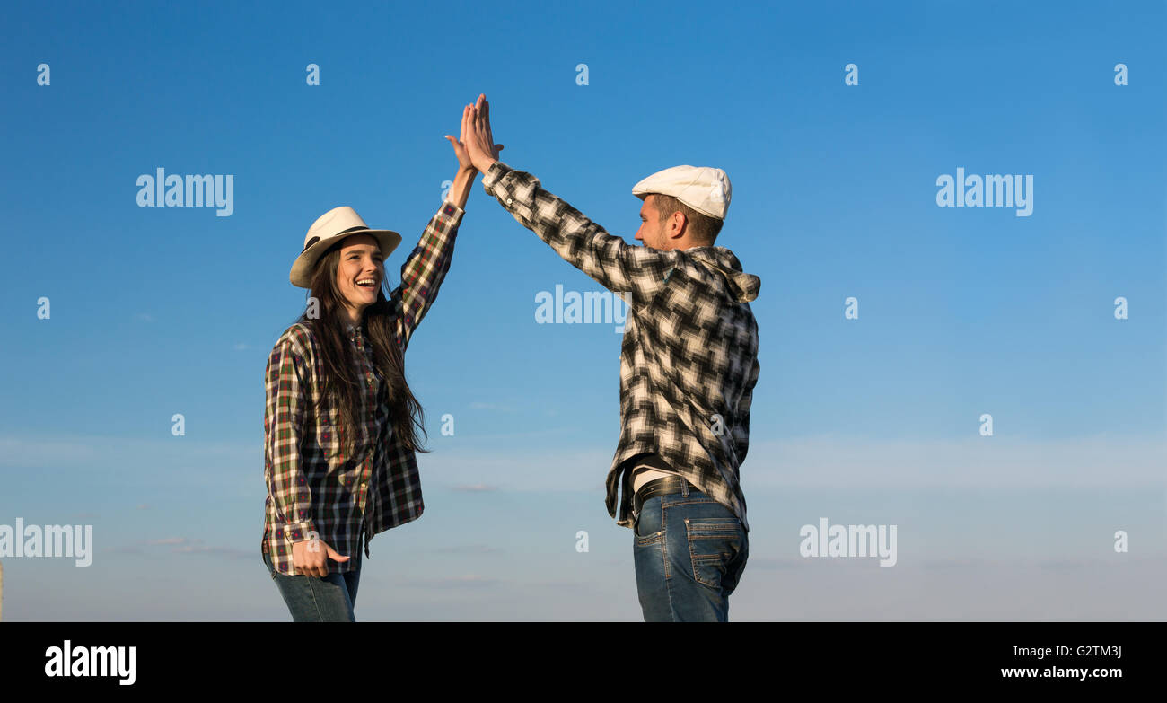 Man and Woman Clapping Hands Each Other Stock Photo - Alamy