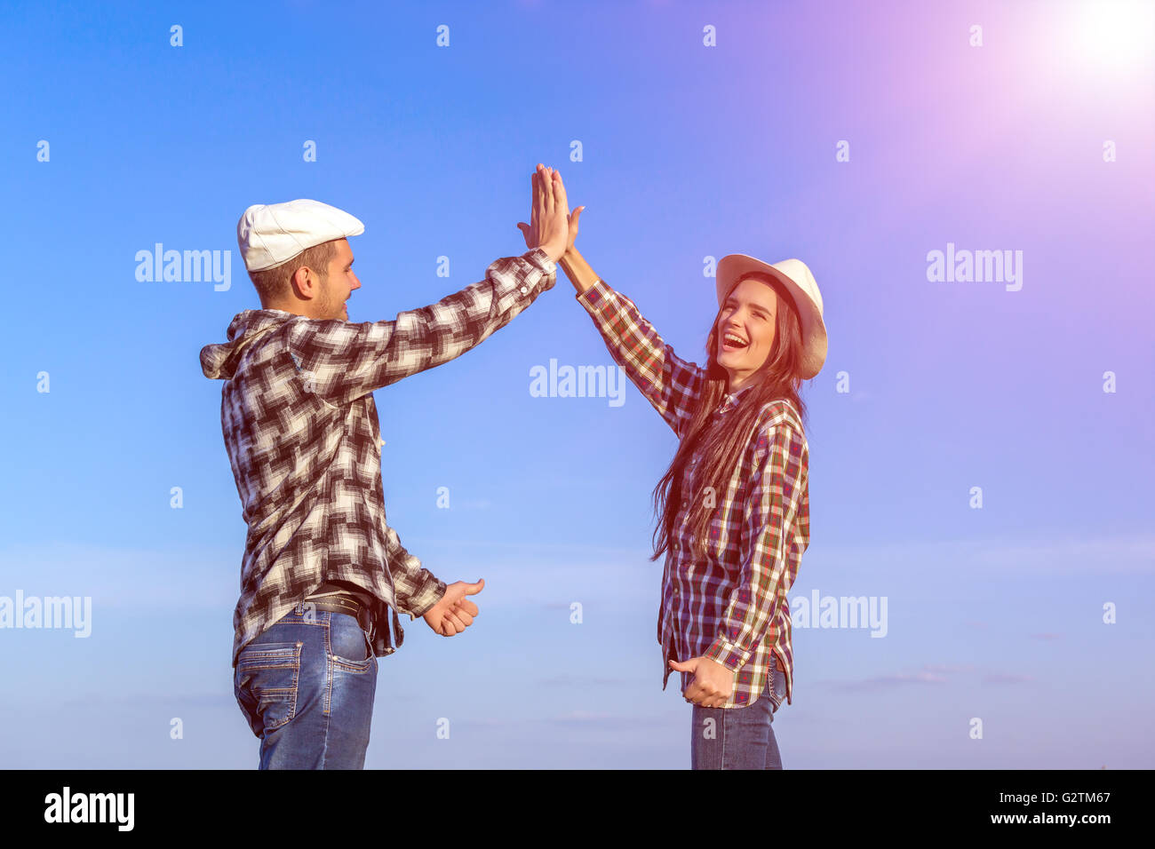 Two People Expressing Happiness and Enjoying Success Touching Hands ...