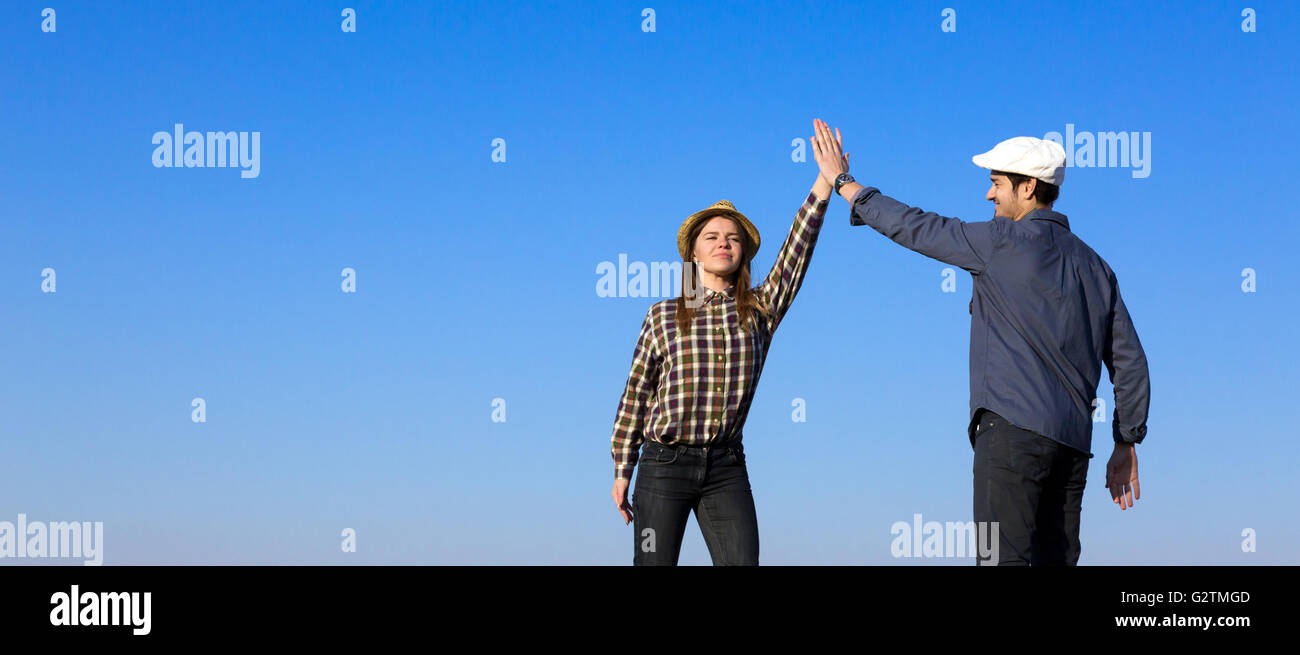 Man and Woman Clapping Hands Each Other Stock Photo - Alamy