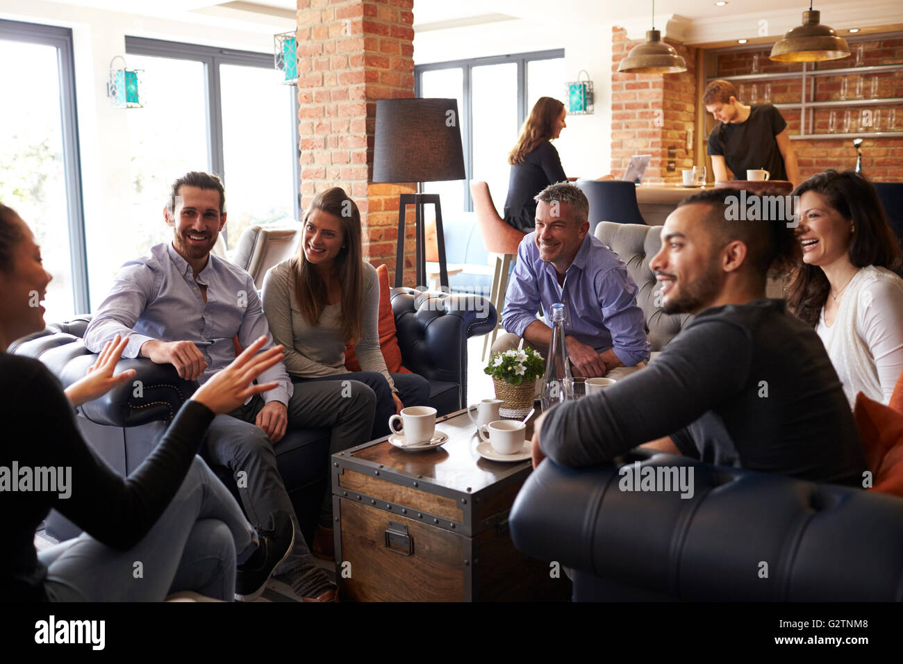 Friends chatting coffee hi-res stock photography and images - Alamy