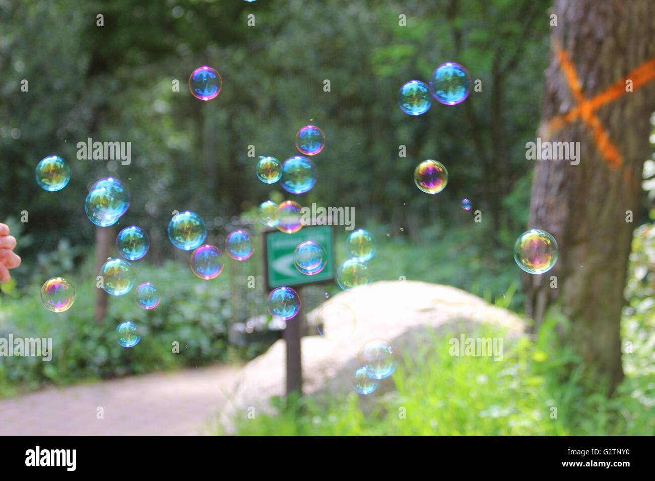 Blowing bursting bubbles hi-res stock photography and images - Alamy