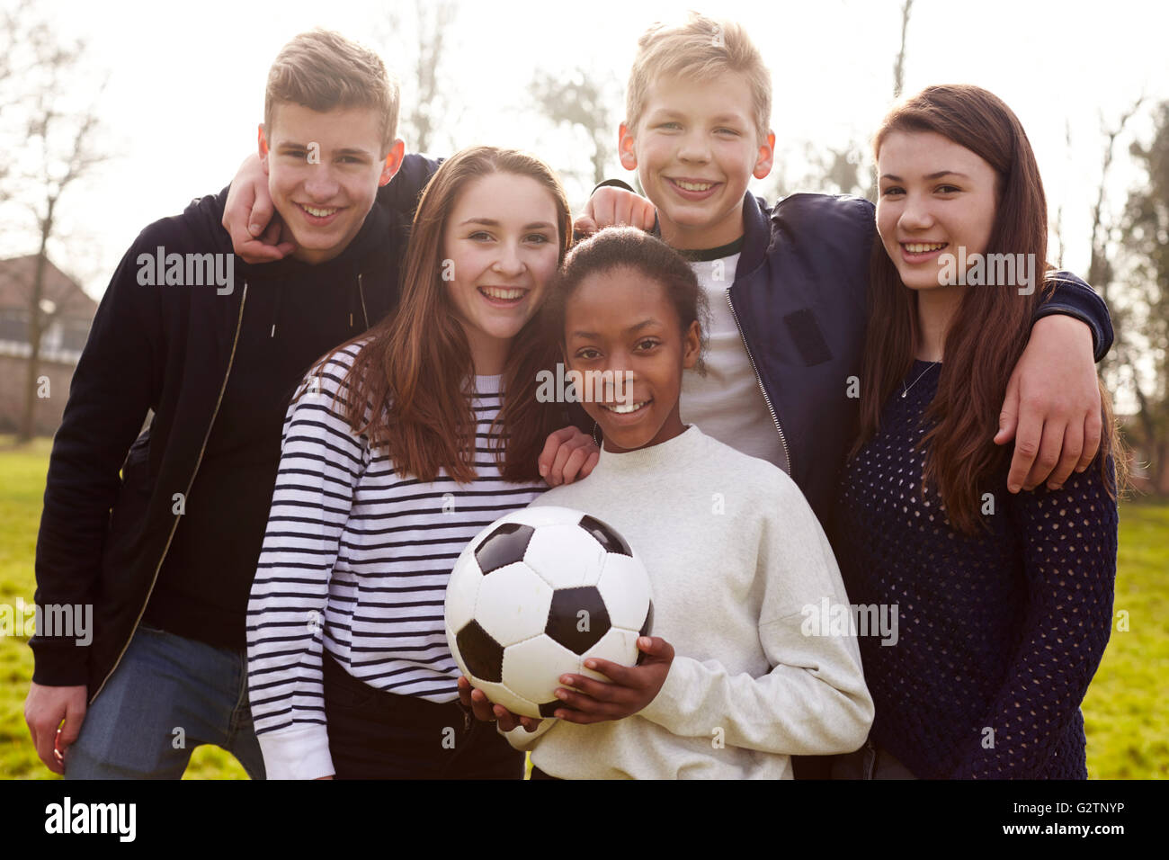 Portrait Of Teenagers Playing Soccer In Park Together Stock Photo - Alamy
