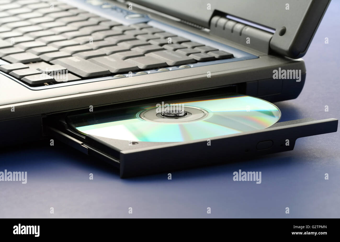 CD ROM in a laptop Stock Photo - Alamy