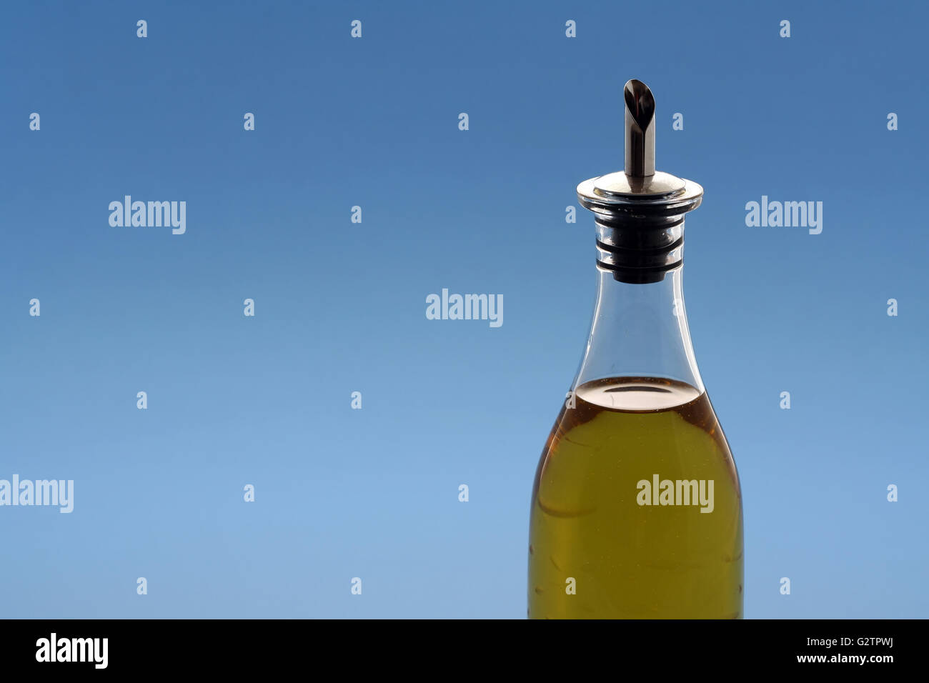 Olive oil in a bottle Stock Photo - Alamy